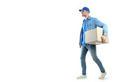 Delivery man walking with a box, isolated on white background, a Person ...
