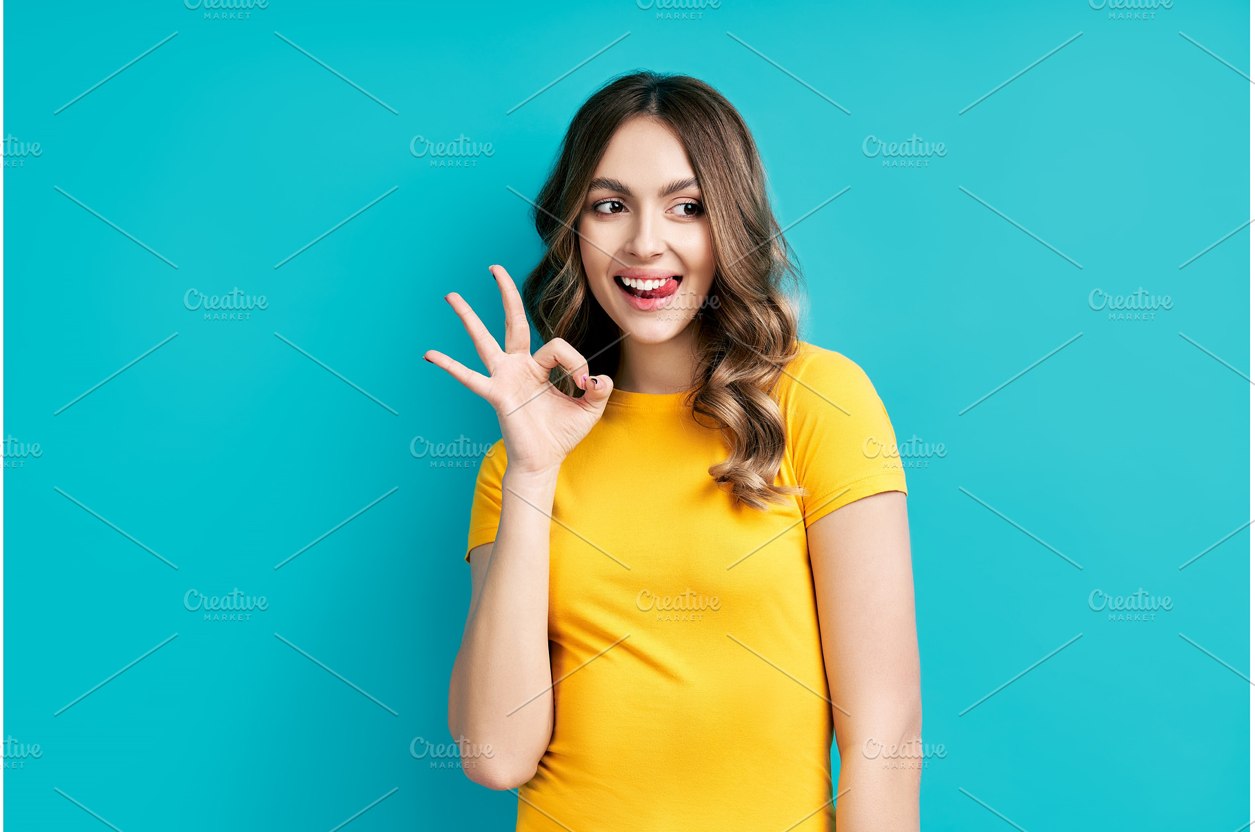 Pretty smiling woman showing OK sign, a Person Photo by Gladkov ...