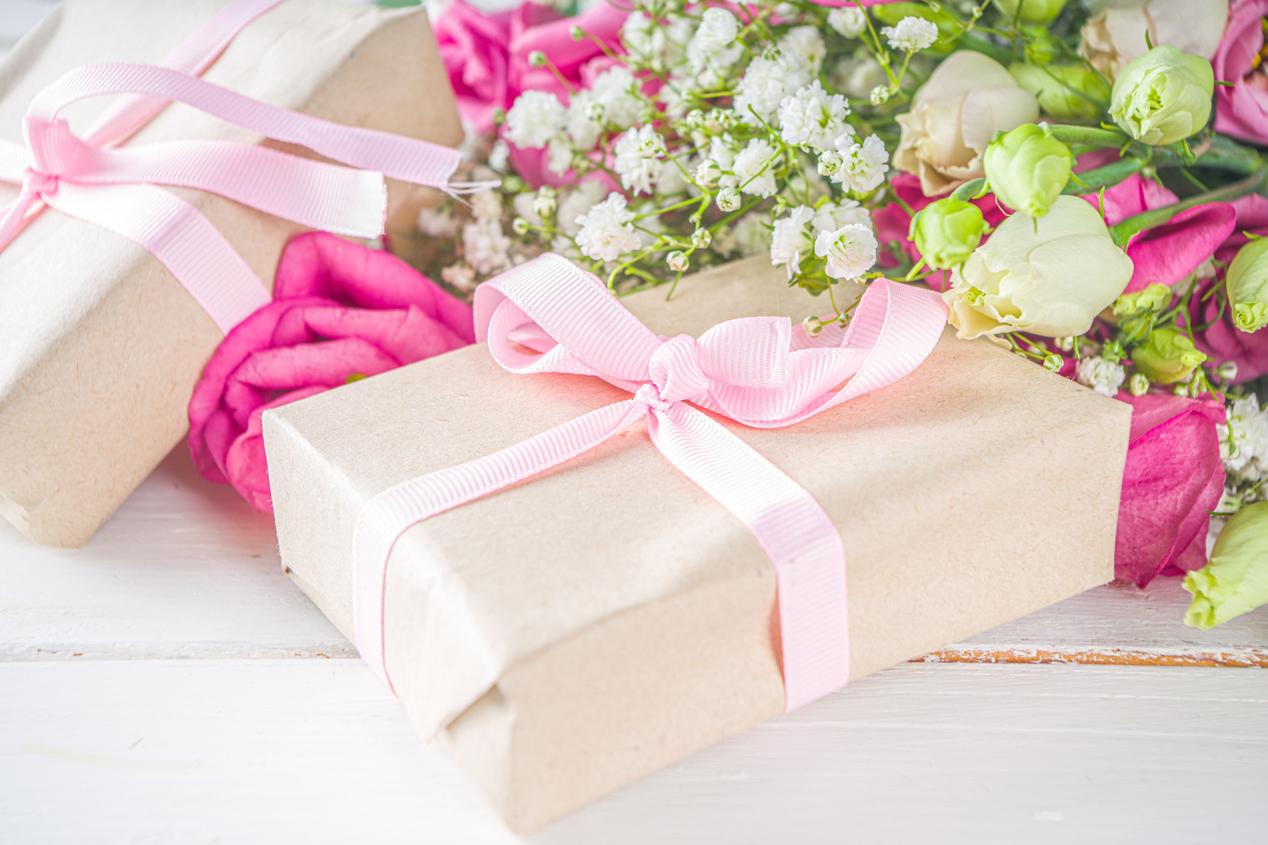 Beautiful spring flowers with gifts, a Holiday Photo by Rimma