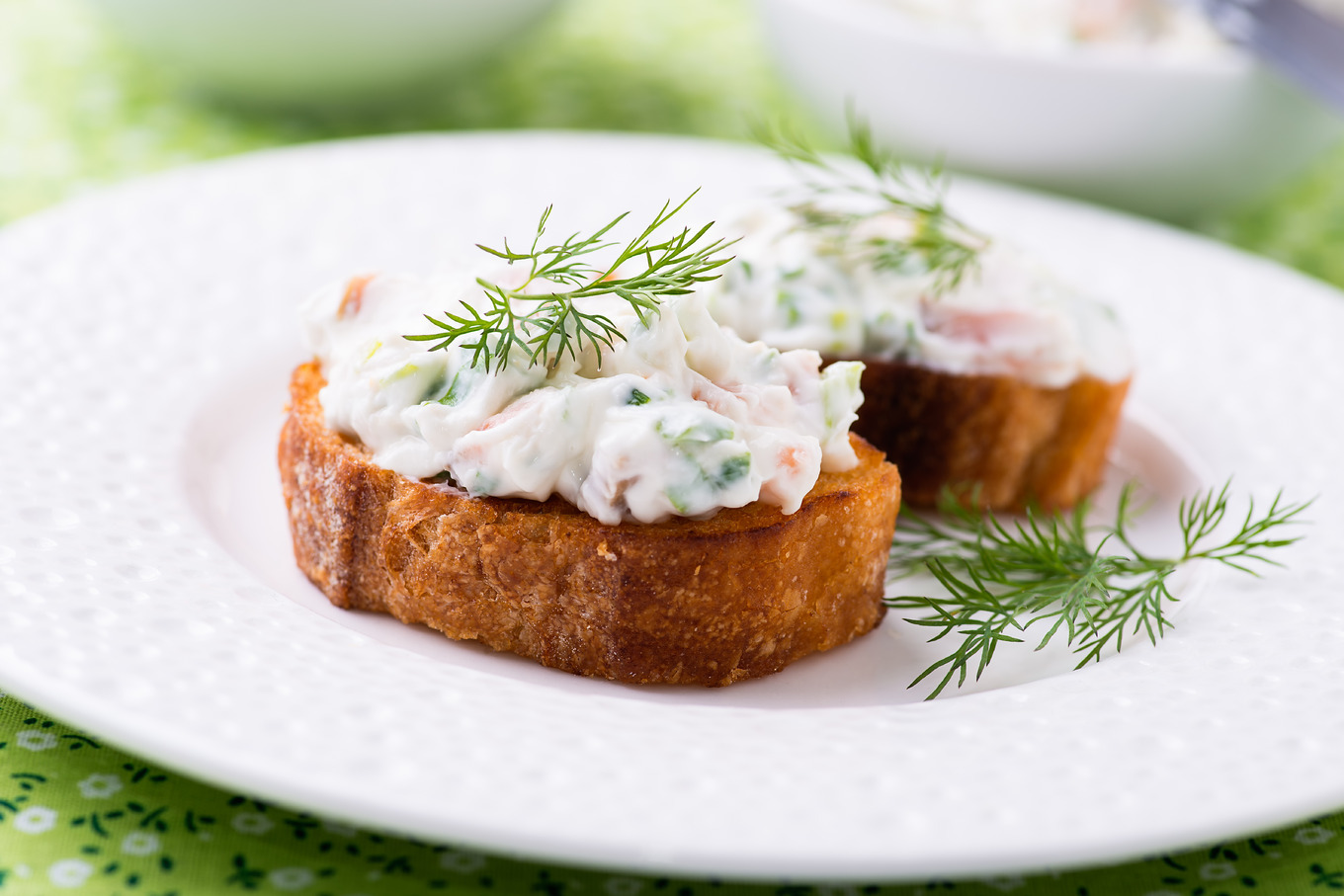 Canape with soft cheese spread featuring salmon, soft cheese, and ...