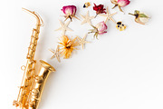 Jazz day saxophone with flowers flat lay top view containing jazz ...