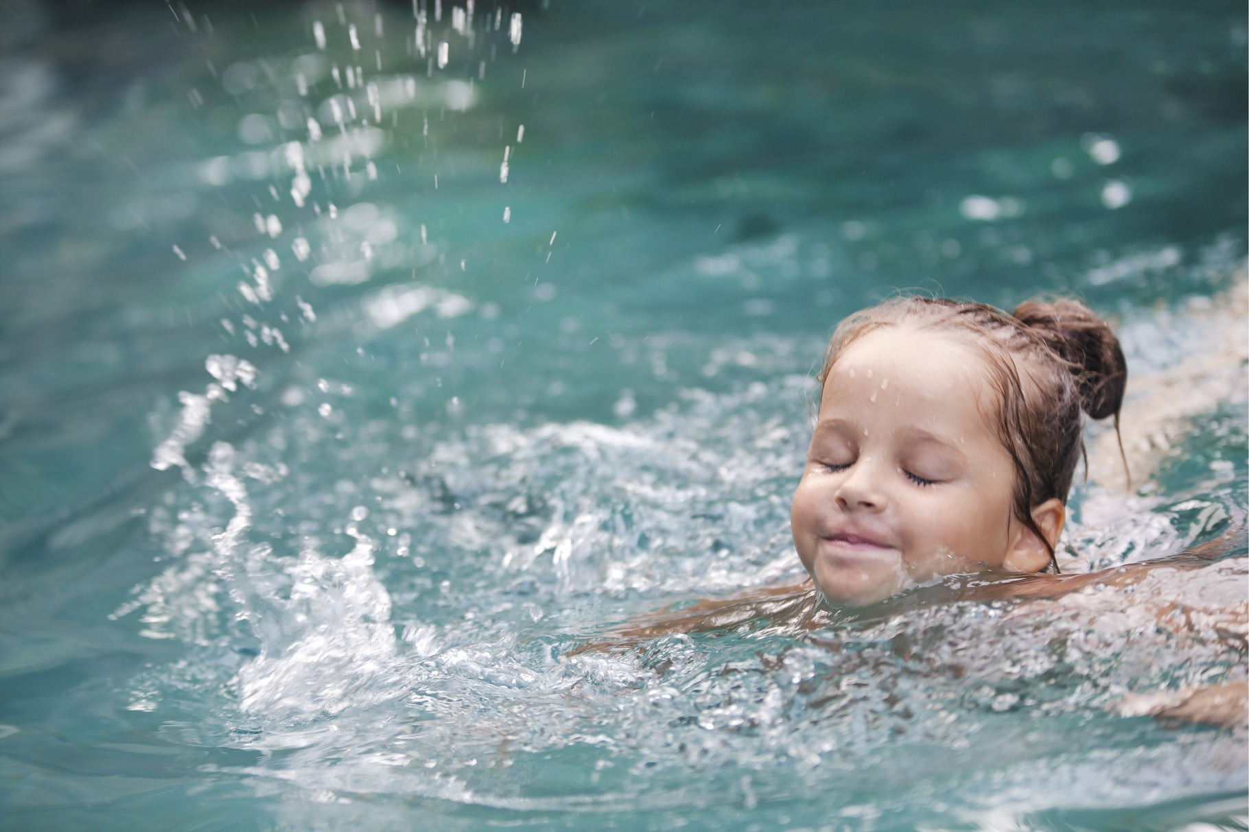 Pretty little girl in swimming pool featuring pool, child, and summer ...