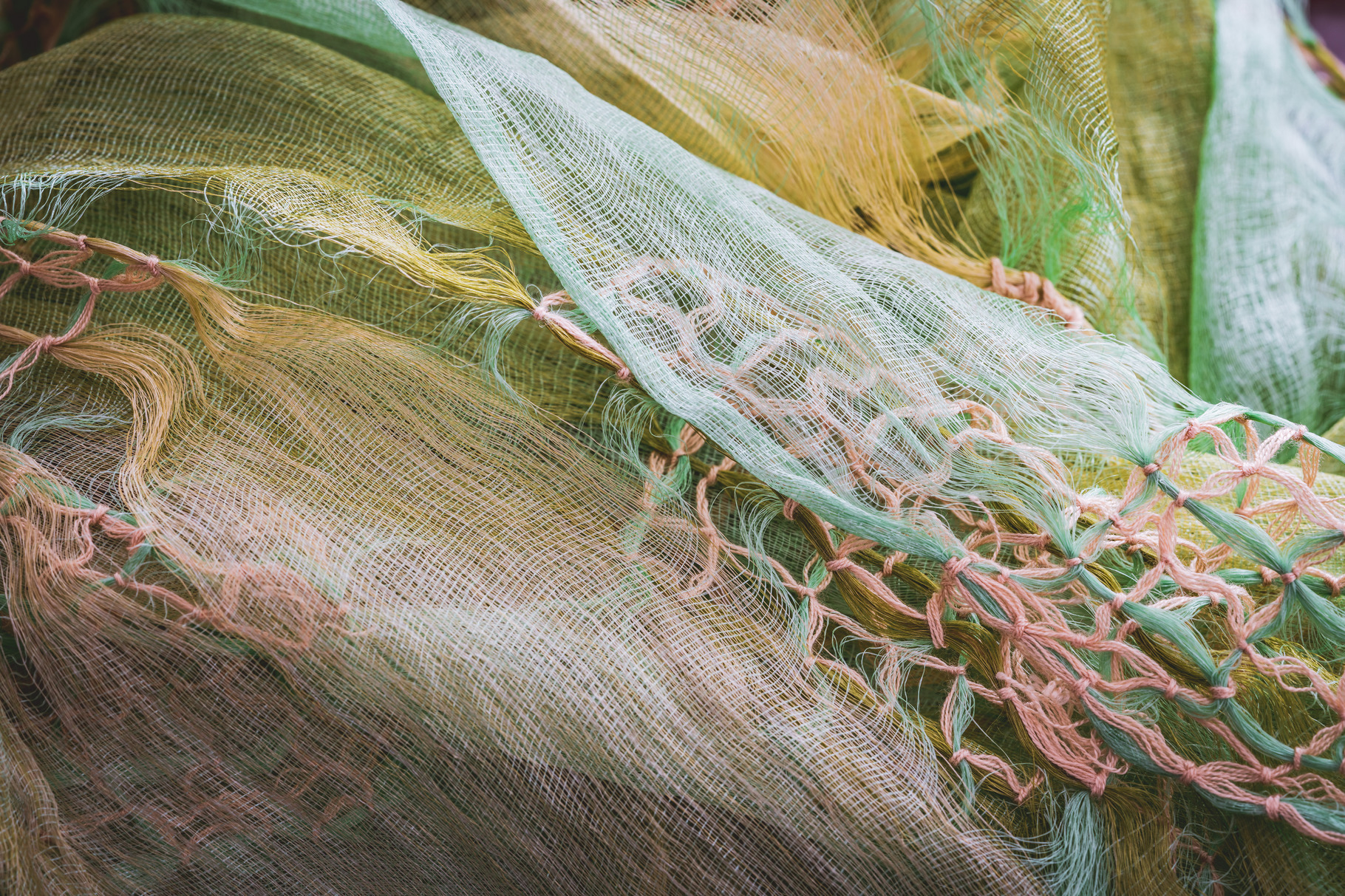 Knots decorating a crumpled shawl featuring fabric, texture, and ...