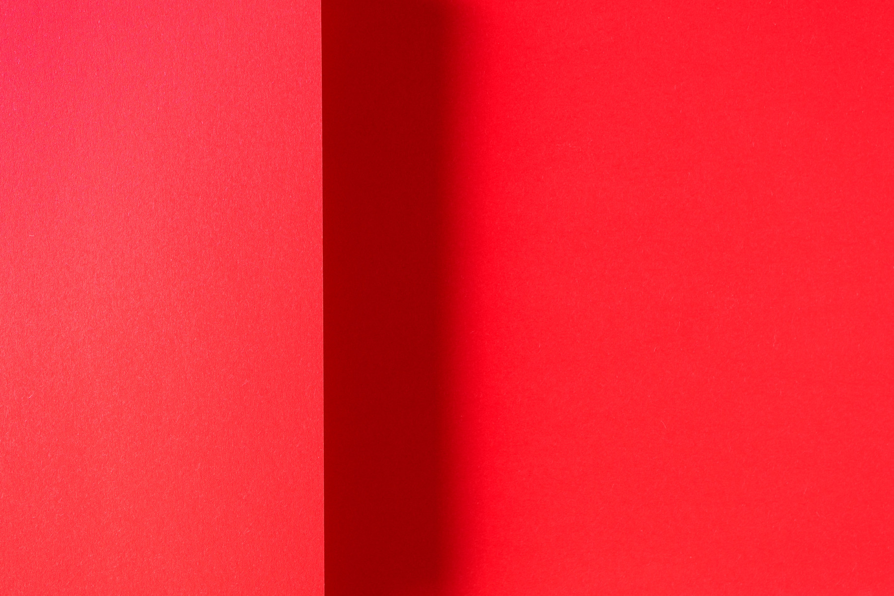 Red color paper background layout, an Abstract Photo by Olha Kozachenko