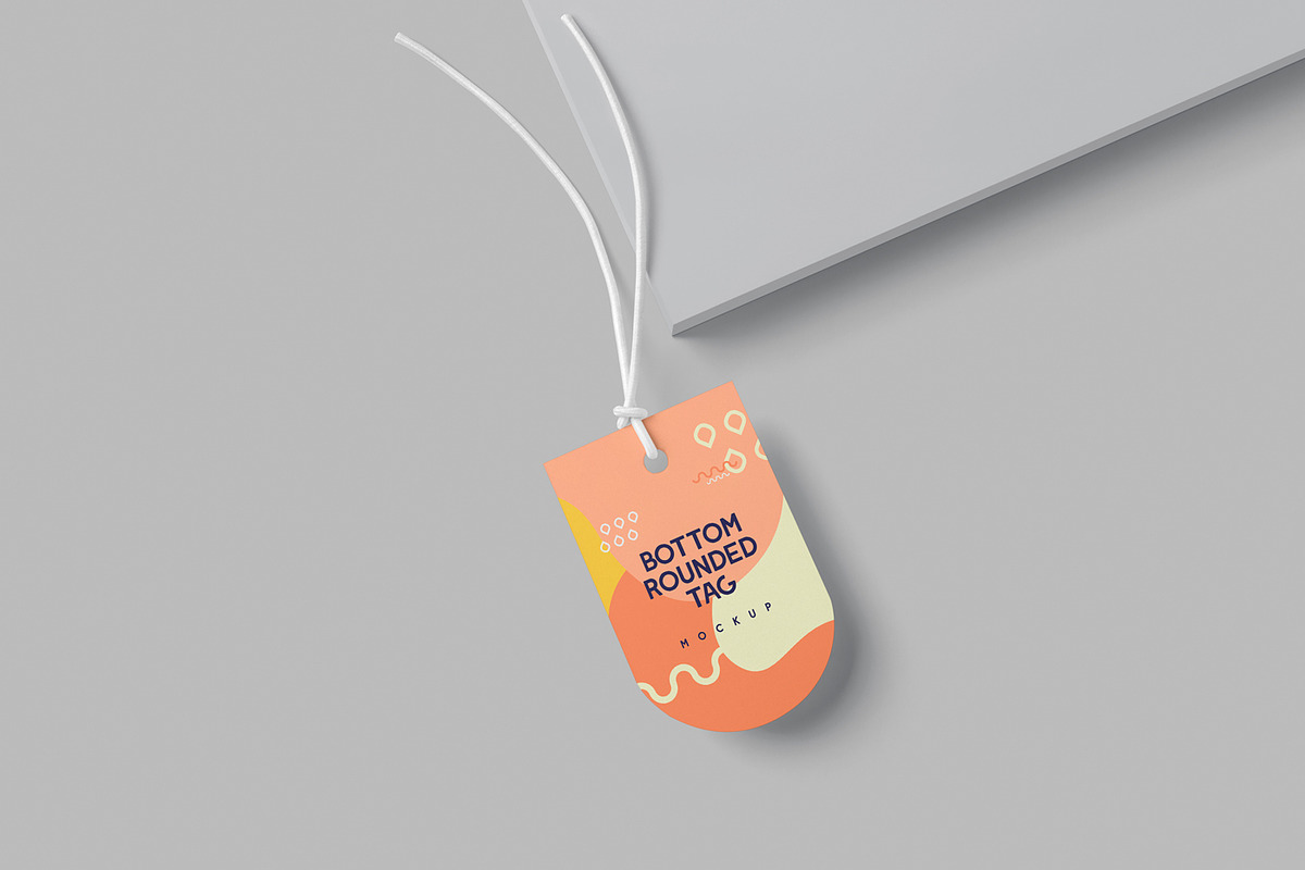 Side Oval Shape Tag Mockups, an Apparel Mockup by DesignNeutrons ...