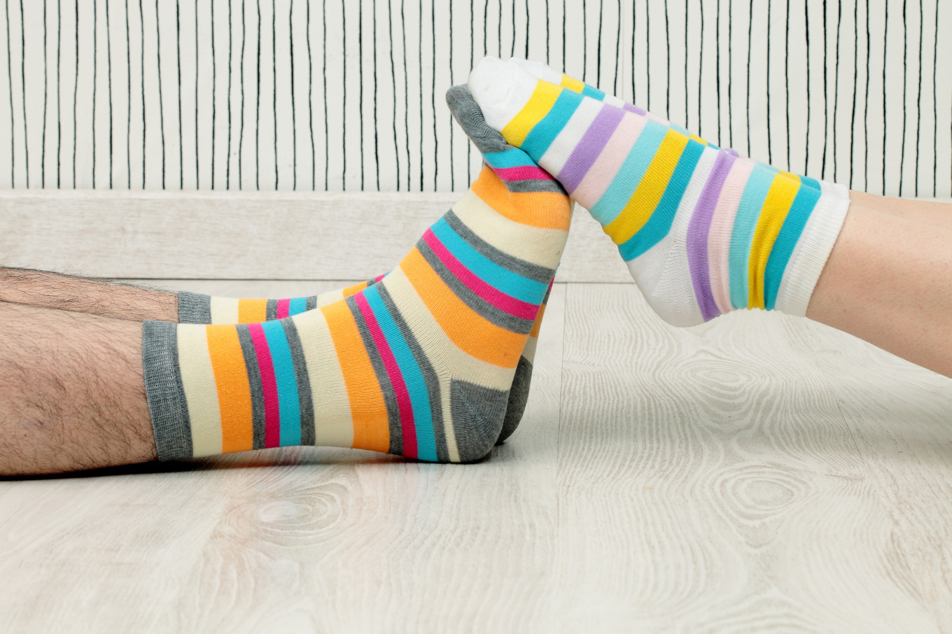 Couple featuring sock, couple, and comfortable, a Person Photo by De ...