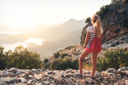 Beautiful woman with backpack containing active, adventure, and ...