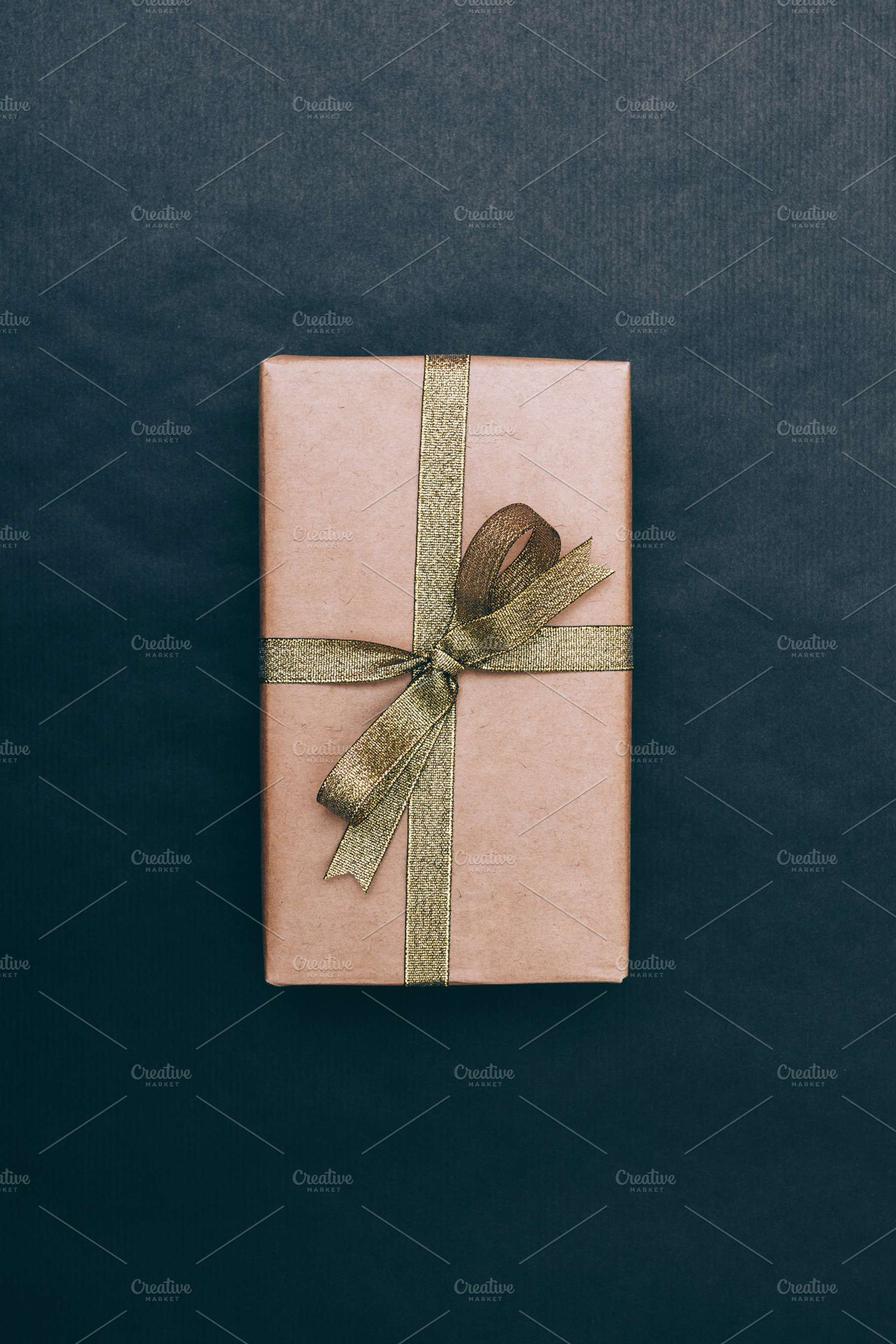 box with a gold ribbon, a Holiday Photo by progressman