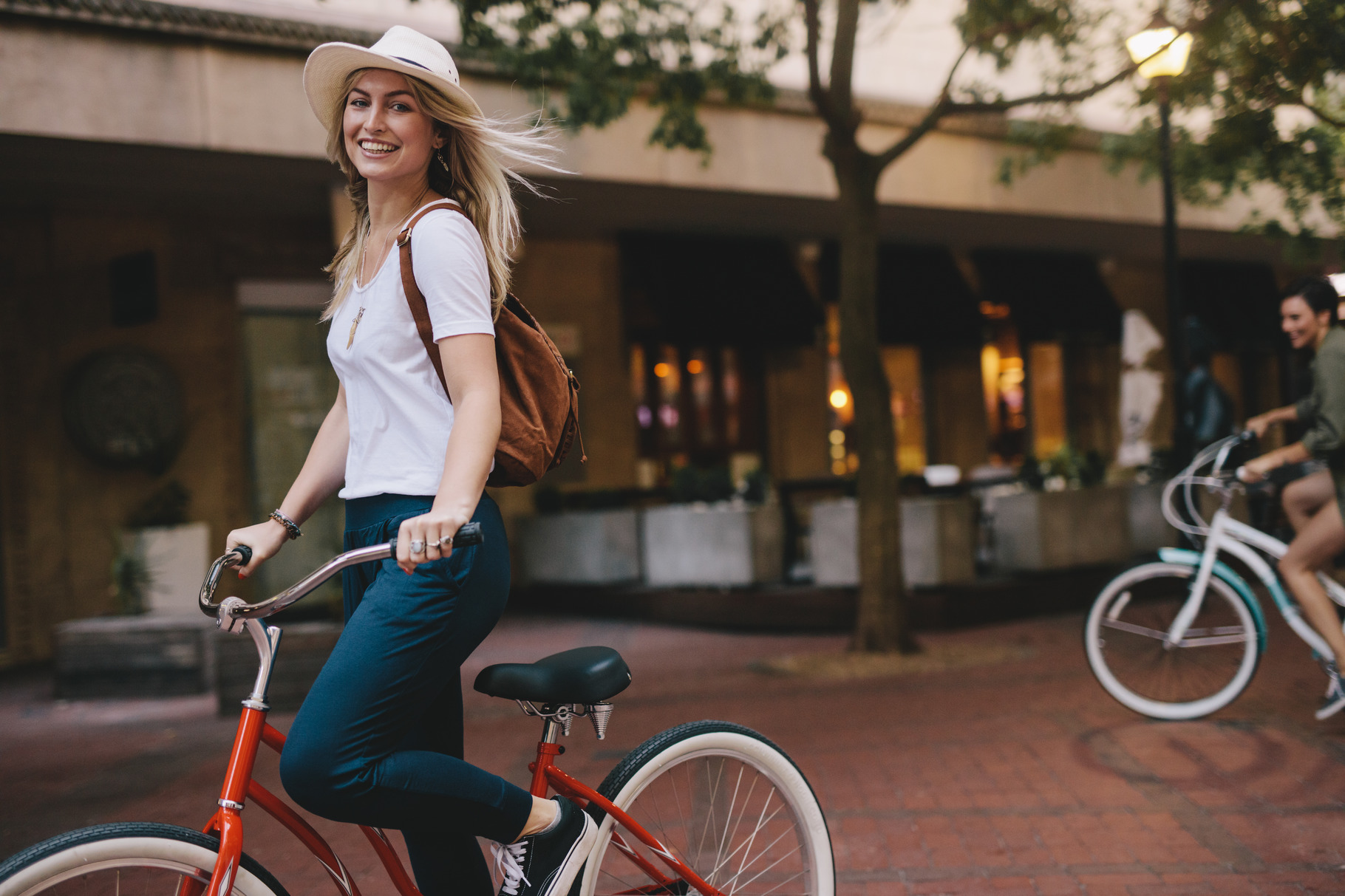 Beautiful woman riding bicycle featuring away, bicycle, and bike, a ...