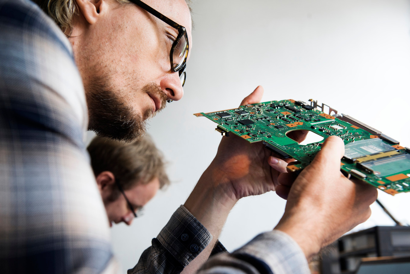 Electronic technician workshop featuring board, circuits, and ...