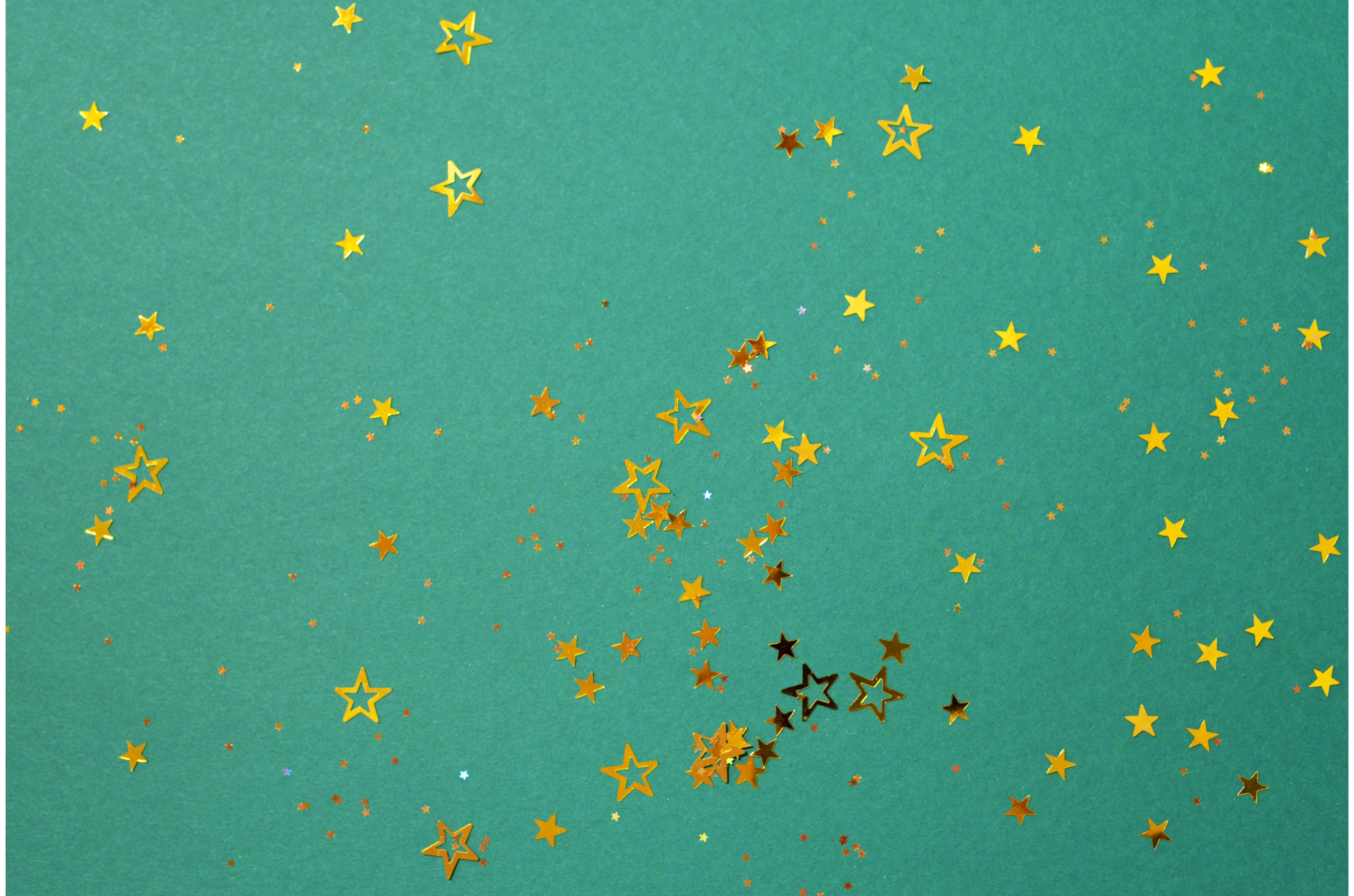 Golden star sparkles on green, a Holiday Photo by Enjoy Photo ...