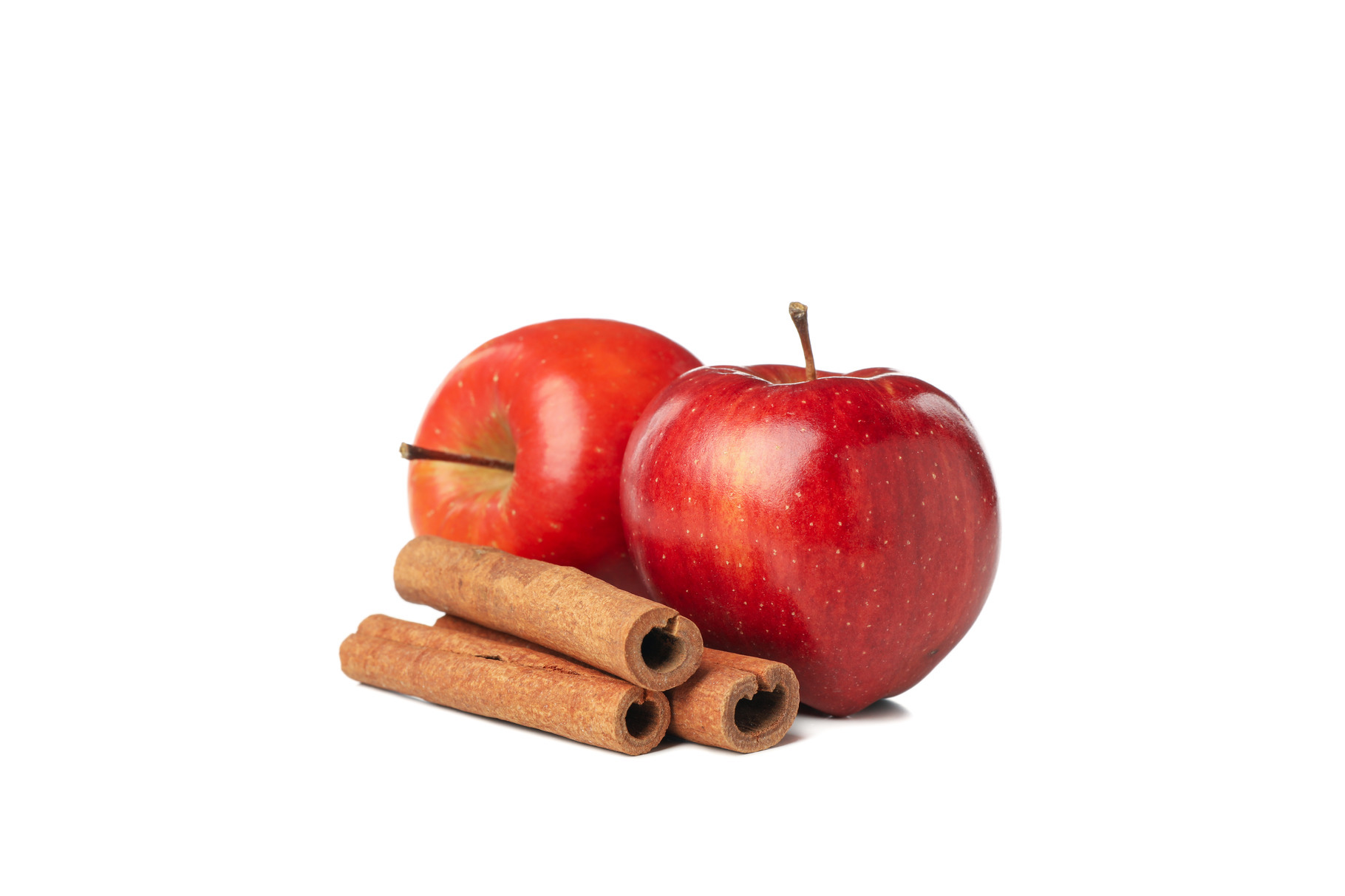 Apples and cinnamon isolated on white background. Natural treatm, a ...