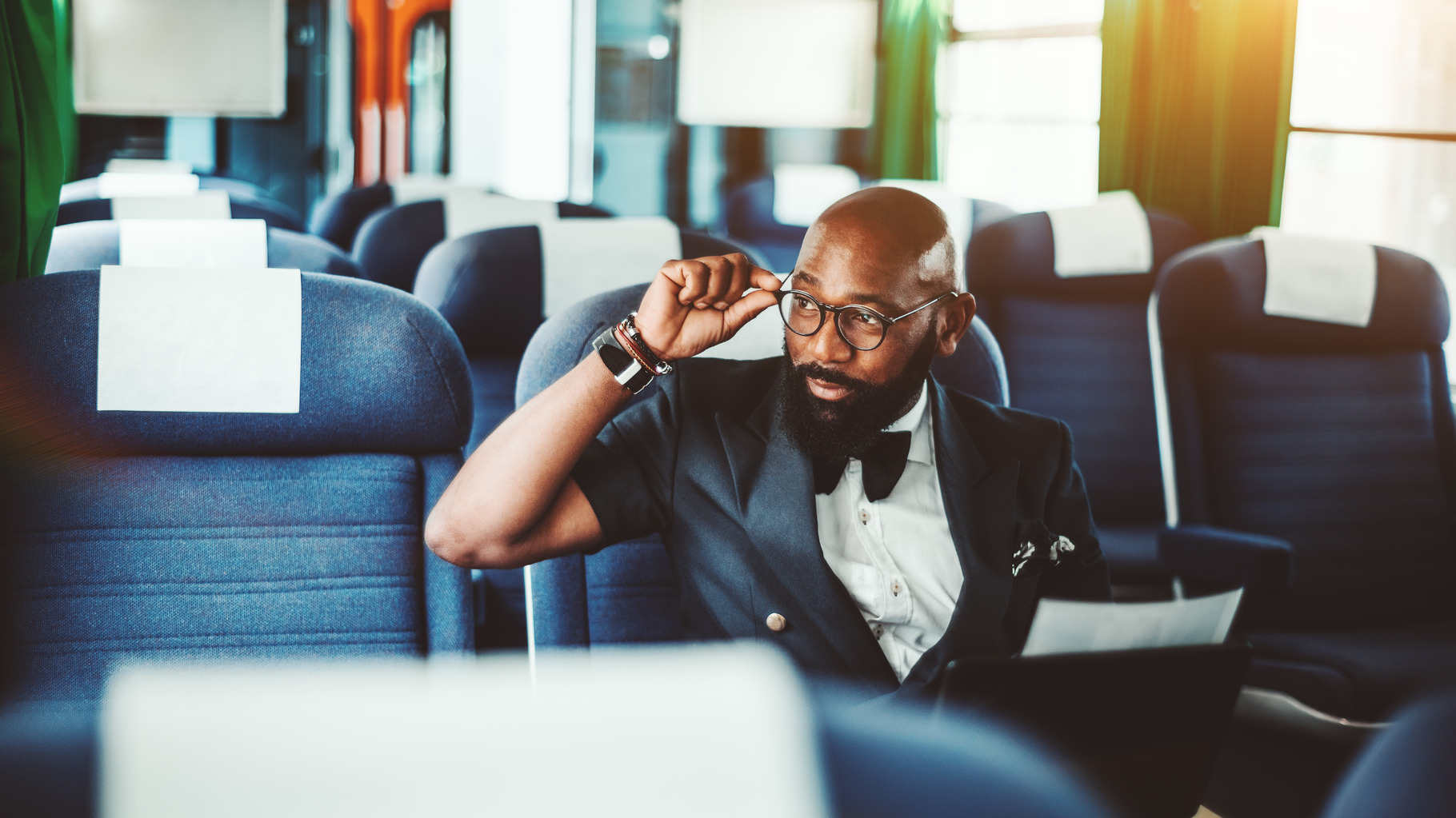 Black man entrepreneur in the train, a Person Photo by SkyNext