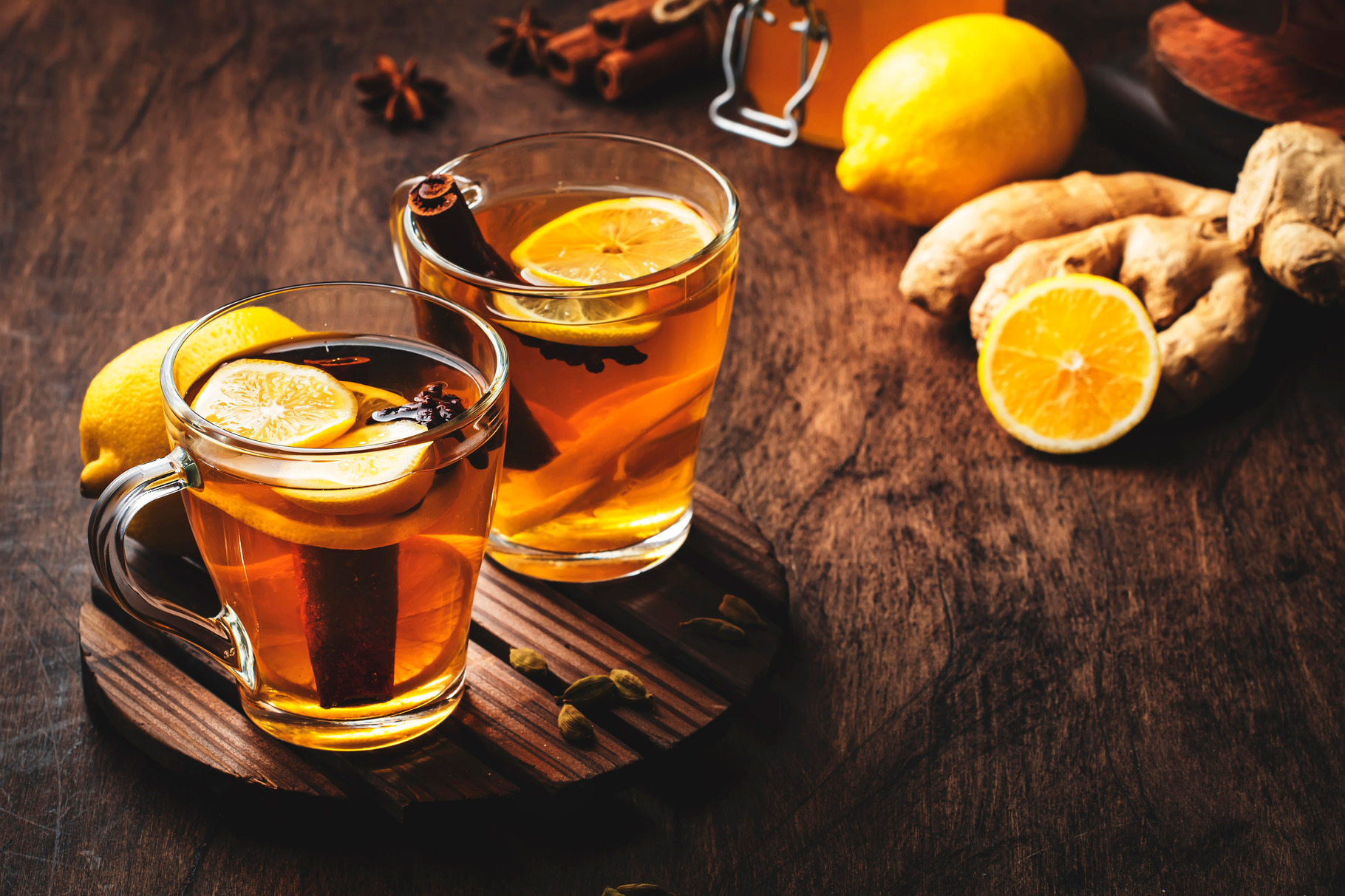 Hot black winter tea with ginger, honey, lemon and spice. Immune, a ...