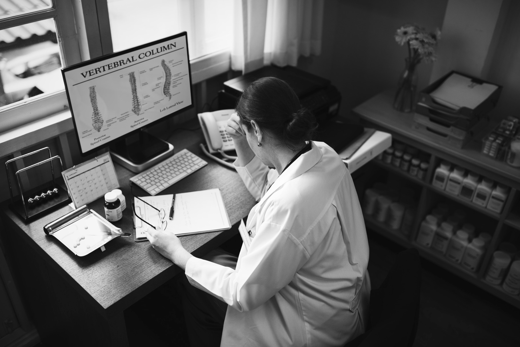 Female doctor studying a case, a Person Photo by rawpixel