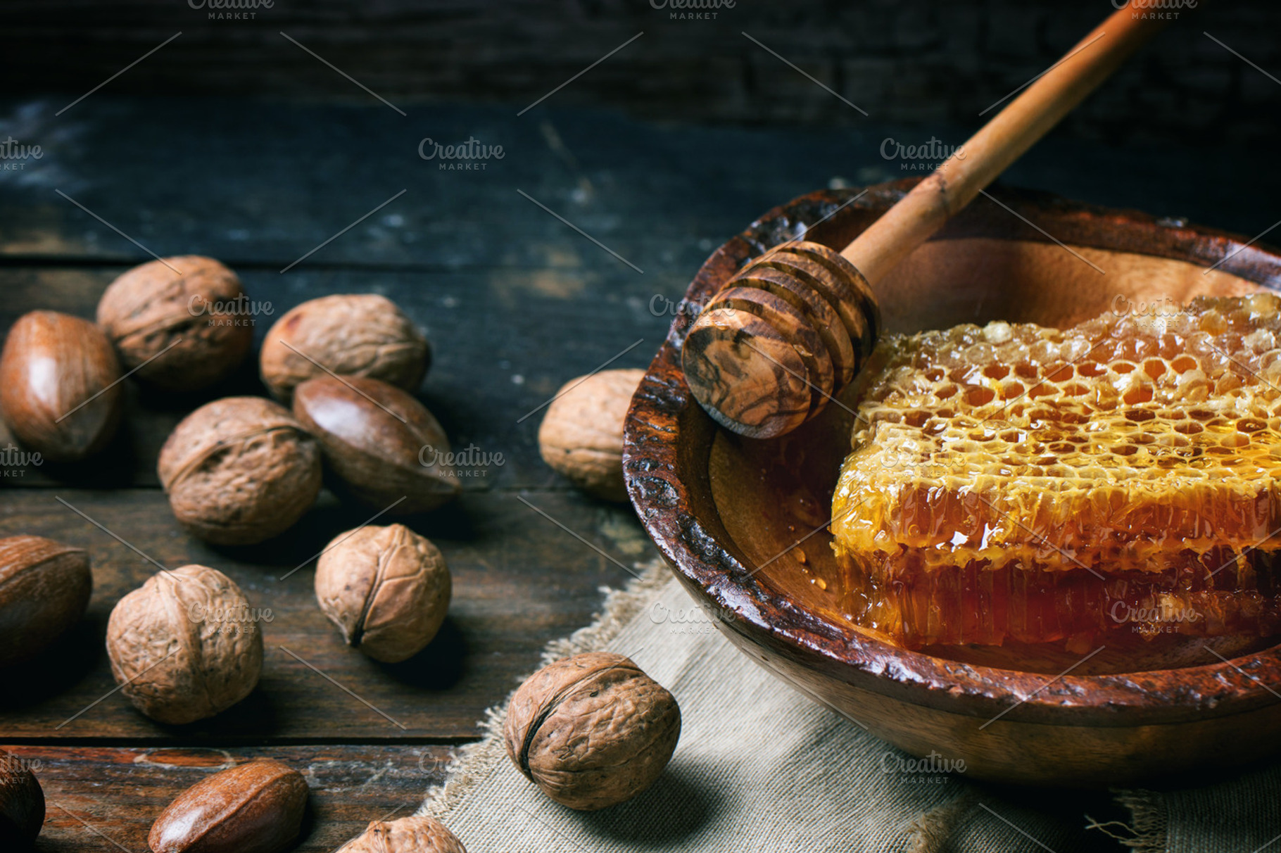 Honeycomb and nuts featuring honey, honeycomb, and wooden, a Food ...