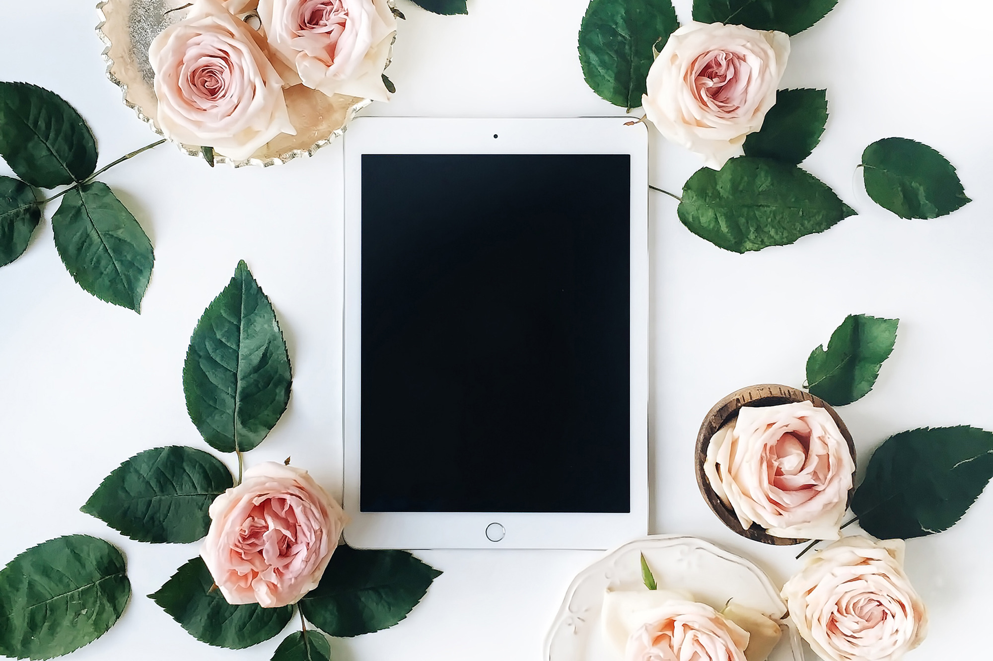 Tablet and rose buds, a Technology Photo by Floral Deco