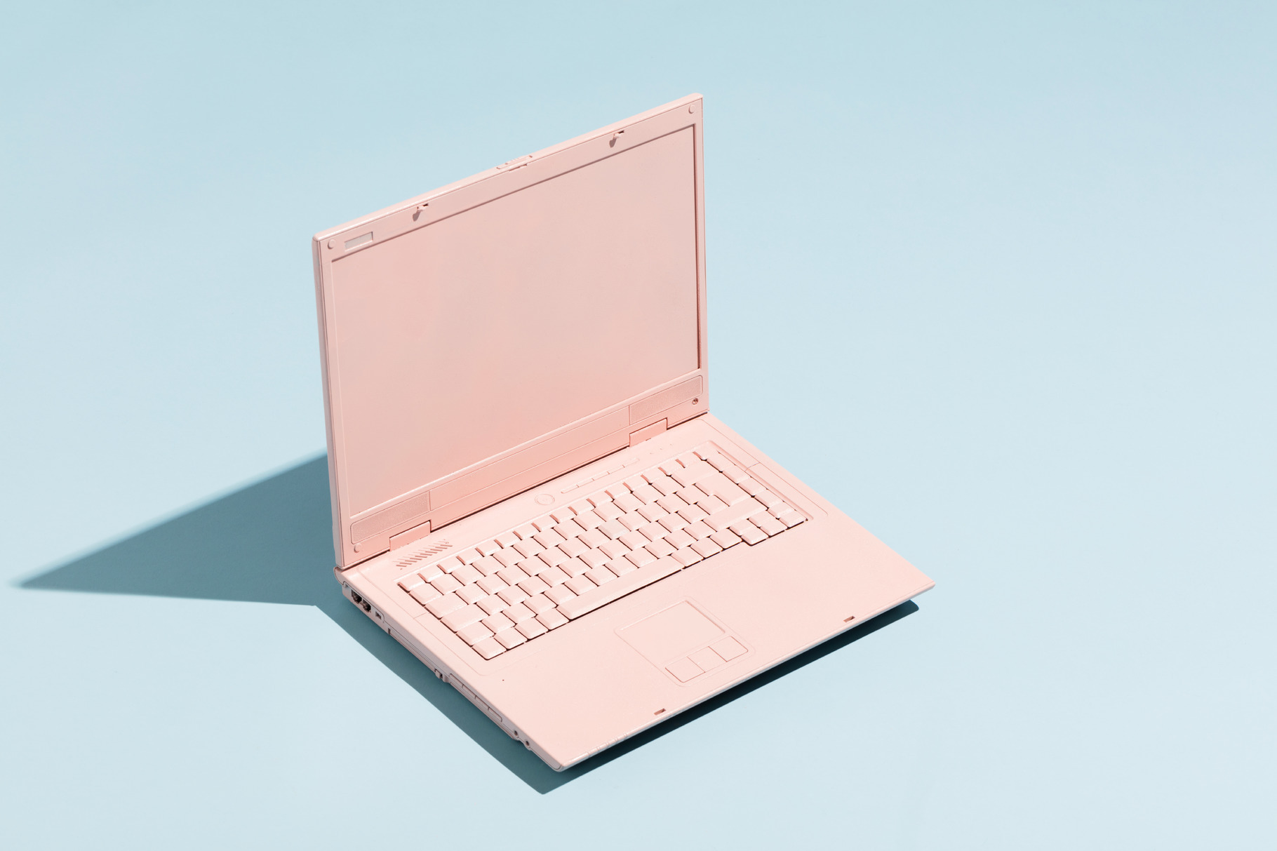 Retro pink laptop on a pastel blue b, a Technology Photo by Photocreo ...