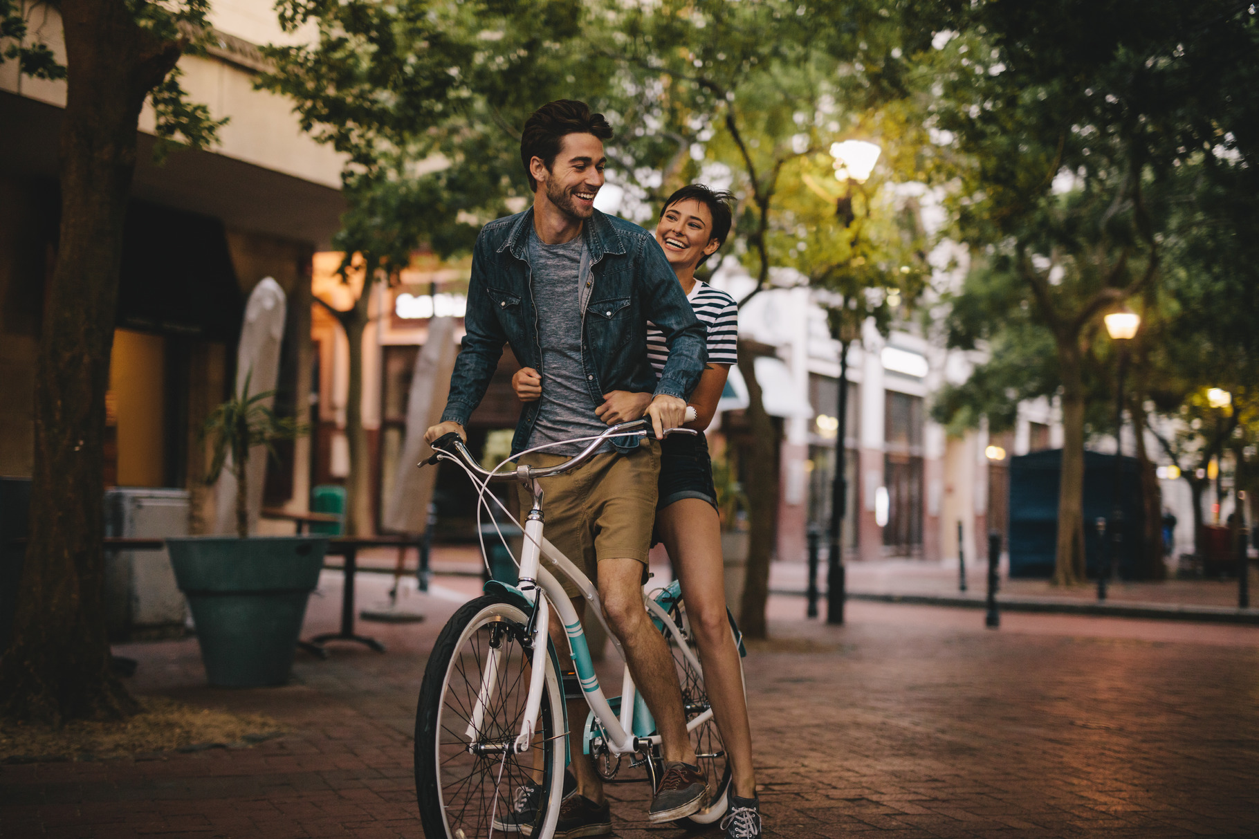 Loving couple riding bicycle, a Person Photo by Jacob Lund