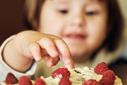 Cute Happy Baby Girl Eating Cake With Raspberries. Adorable little girl ...