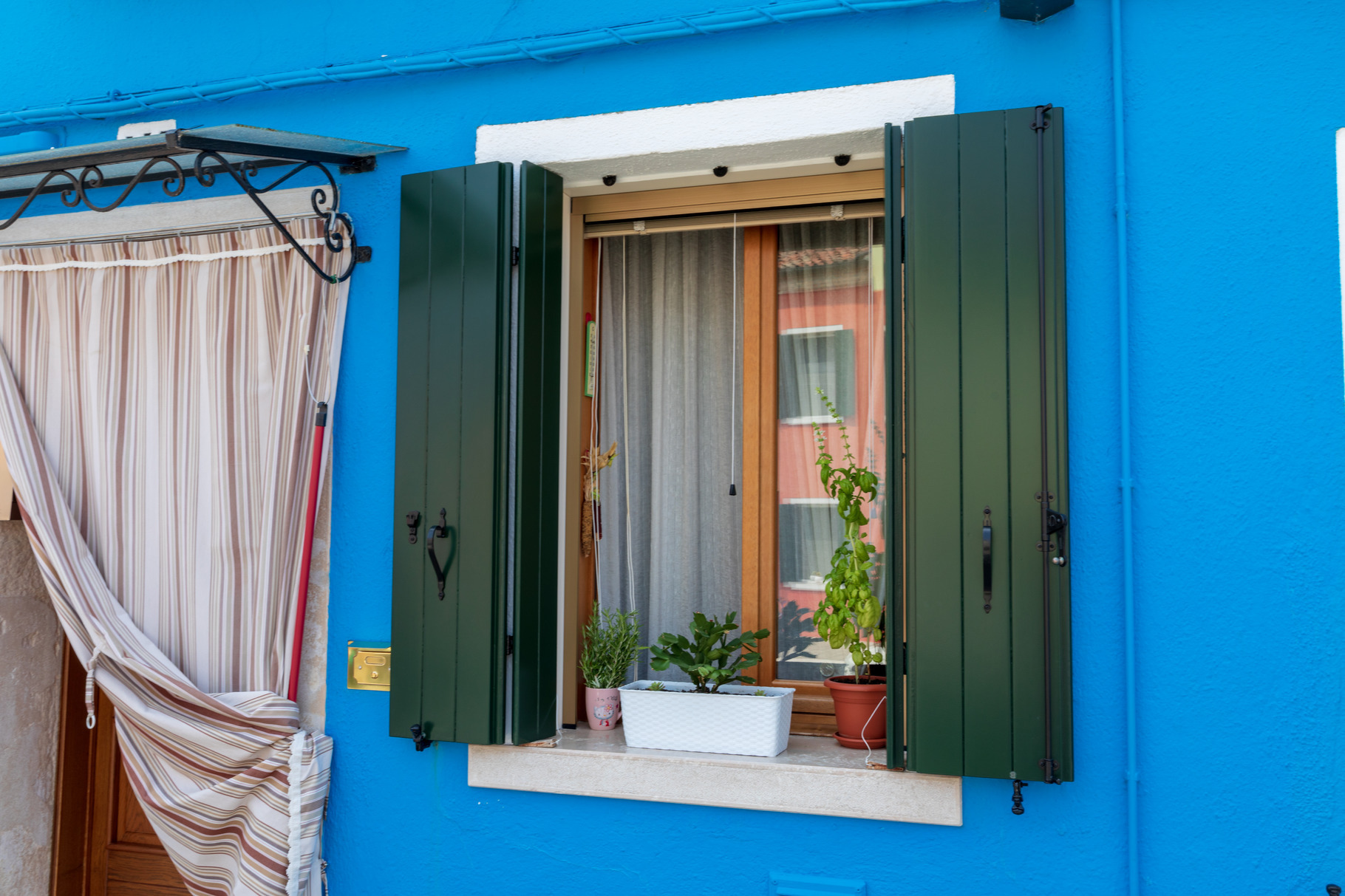 Brightly coloured homes of burano featuring architecture, beautiful ...