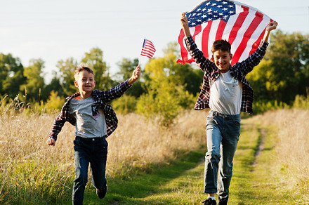 Two brothers running with USA flag. America holiday. Proud to be, a ...