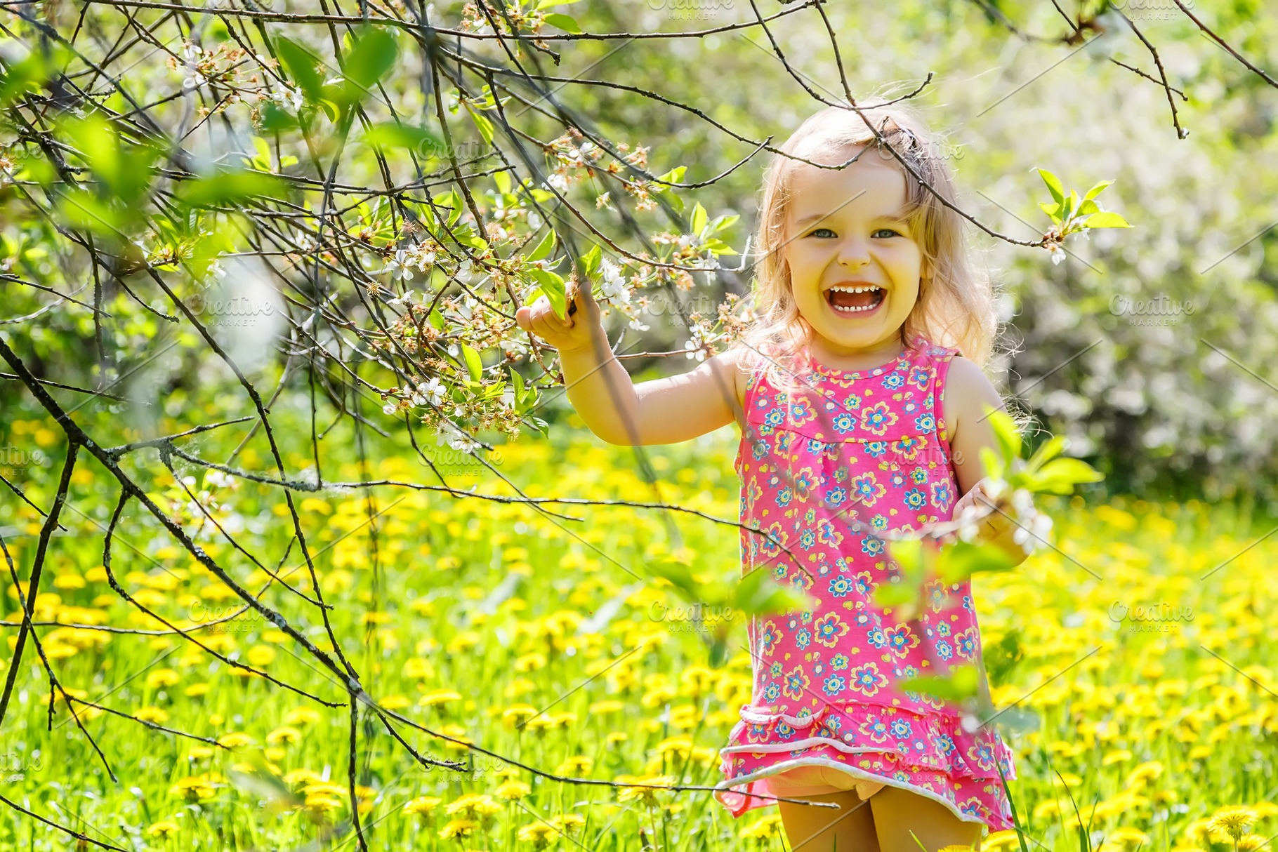 Happy little girl in spring sunny featuring girl, child, and little, a ...