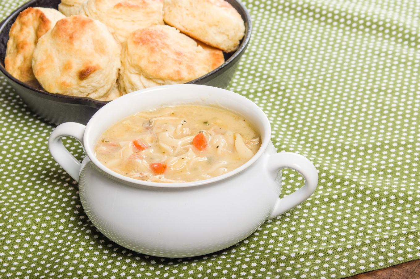 Biscuits and chicken soup featuring food, soup, and chicken noodle soup ...