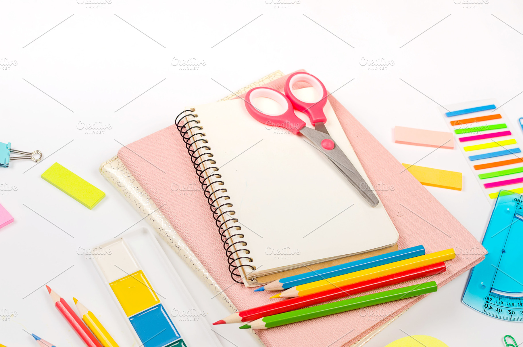 Flat lay composition with colorful school supplies on white back, a ...