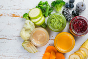 Colorful baby food purees in glass containing baby, food, and jar, a ...