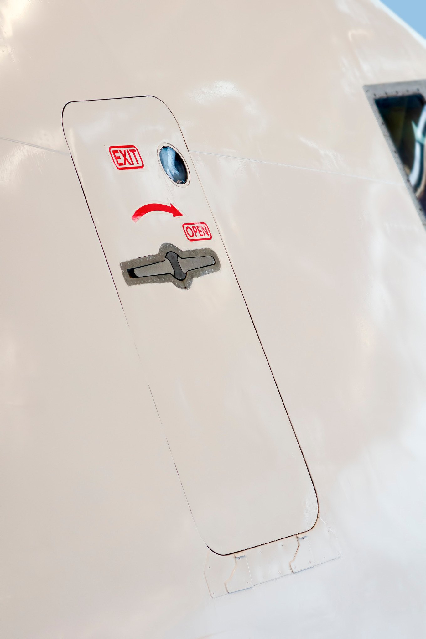 Aircraft emergency exit featuring exit, emergency, and plane, a ...