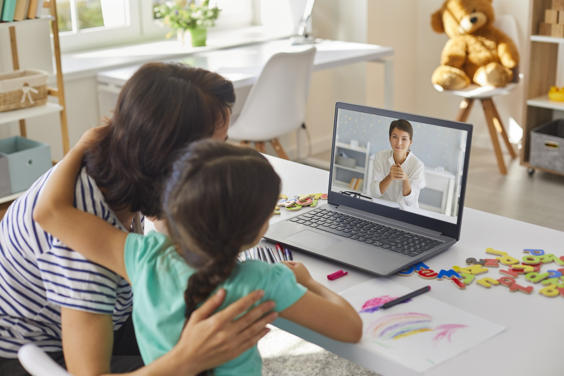Mother and daughter communicating | People Images ~ Creative Market