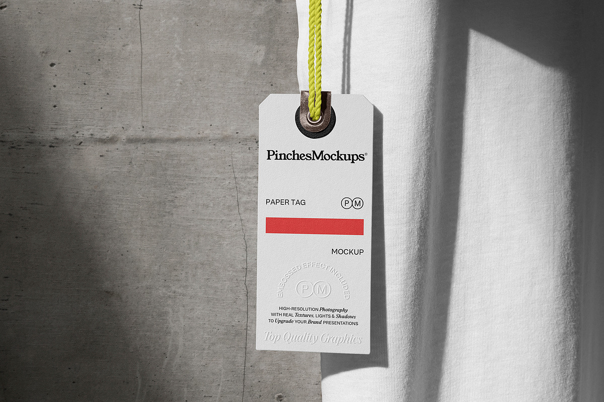 Paper Tag Hanging from T-Shirt Mockup