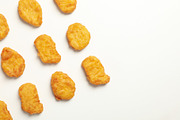 Flat lay with fried chicken nuggets on white background, a Food & Drink ...