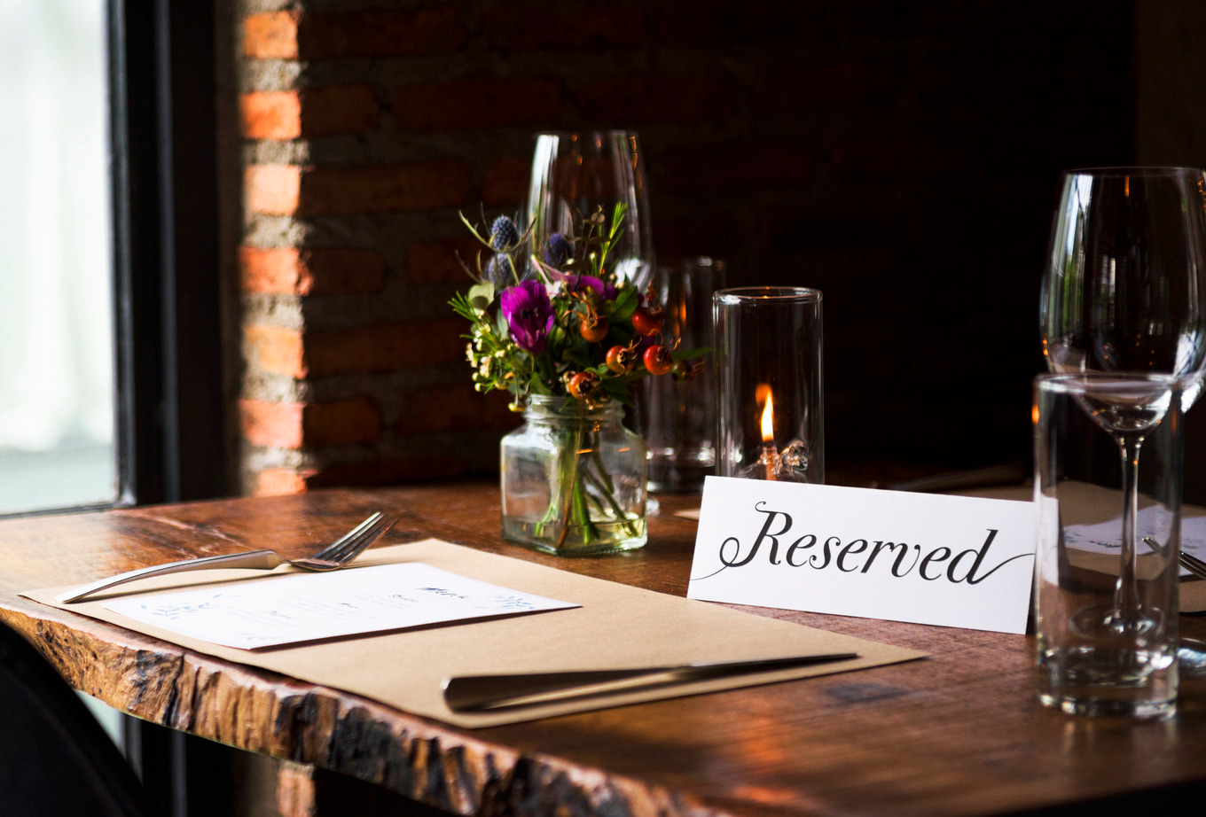 Reserved table at a restaurant featuring beverage, cafe, and catering ...