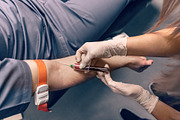 Venipuncture or venepuncture procedure, a Photo by Grafvision photography