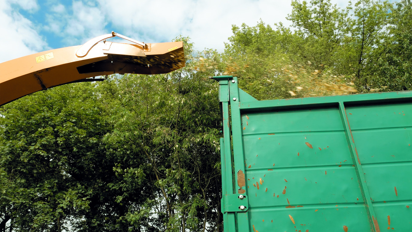 A giant waste blower is pouring the old scarps, an Industrial Photo by ...