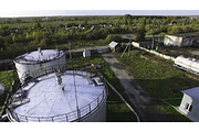 Aerial top view oil storage tanks, a Graphic by Media Whale Stock