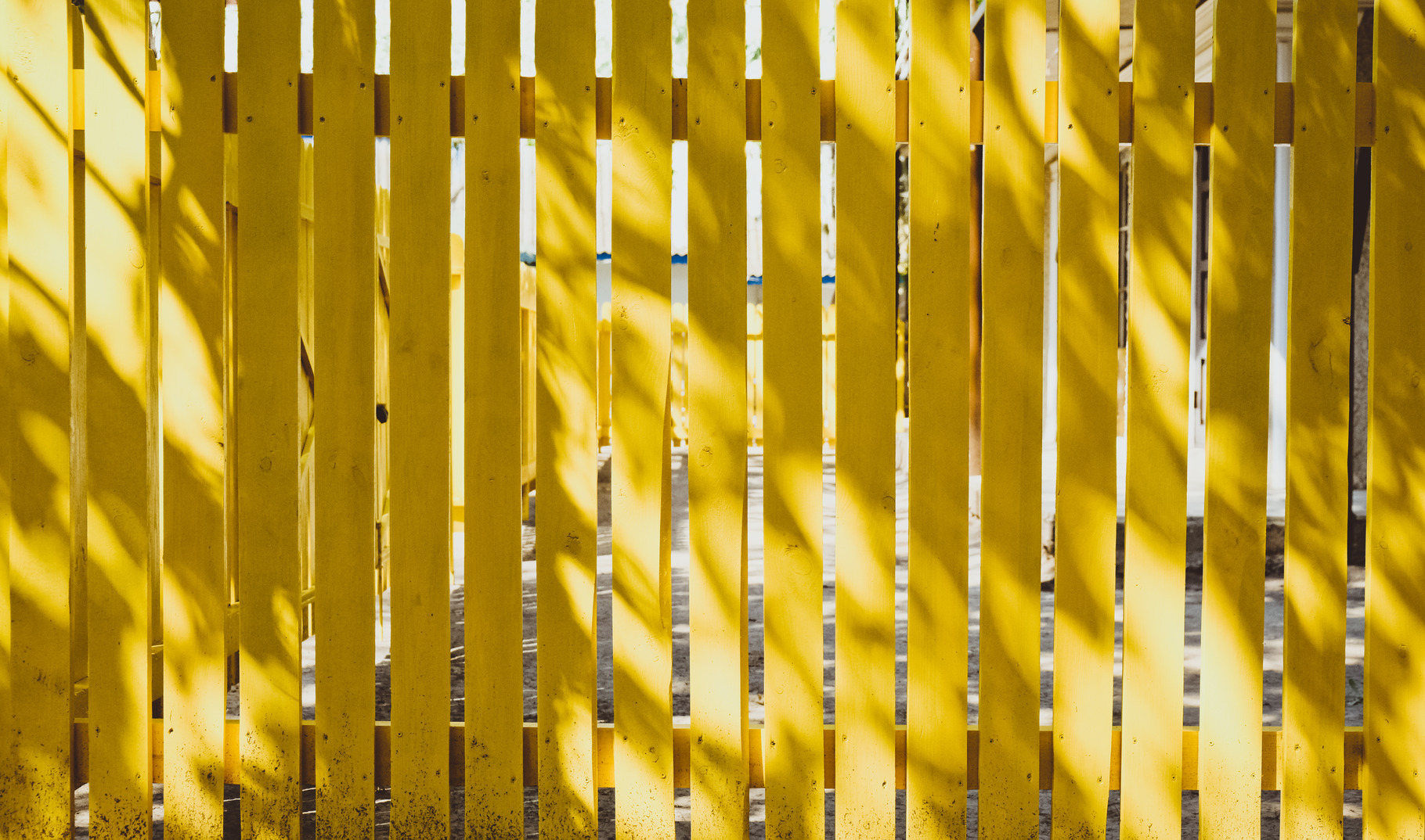 Yellow Painted Wooden Fence, an Abstract Photo by Pro.Motion