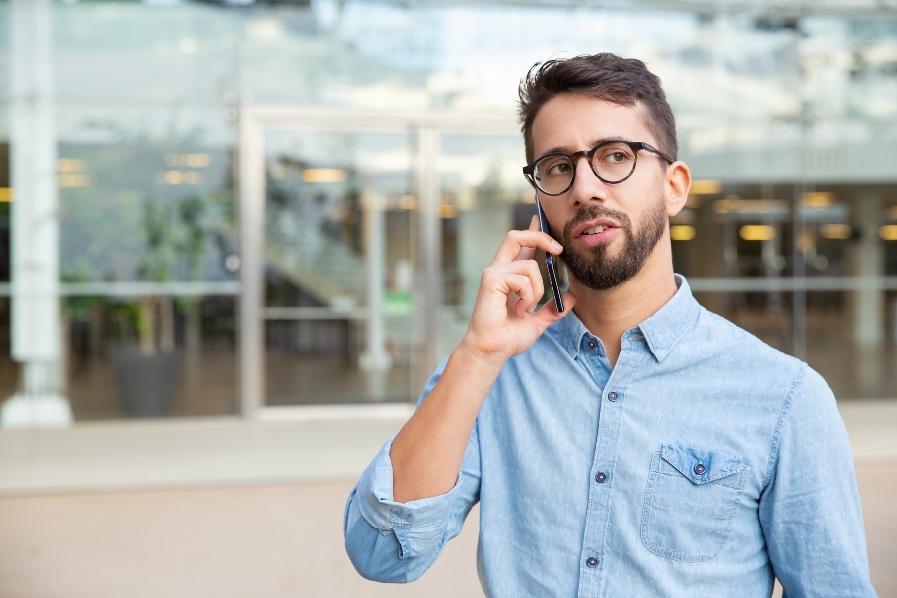 Serious young man talking, a Person Photo by SurfsUpVector