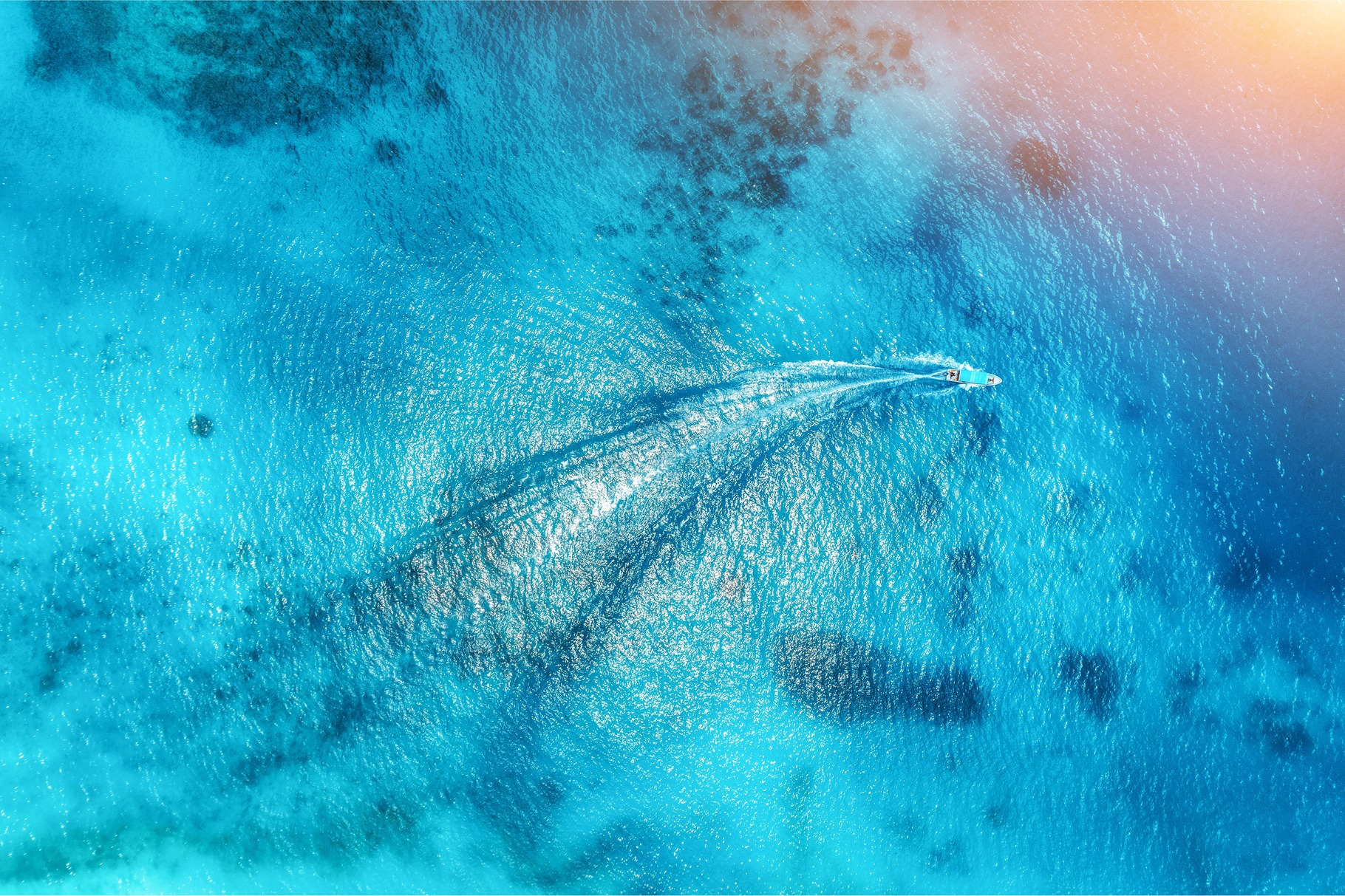 Aerial view of floating speed boat featuring boat, motorboat, and yacht ...