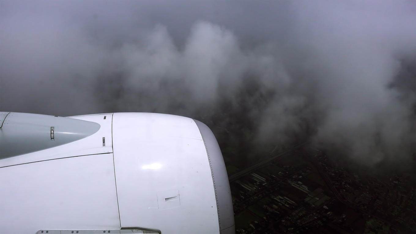 Airliner is flying in a bad weather conditions featuring aircraft ...