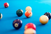 Billiard balls setup on a pool table, a Photo by rawpixel