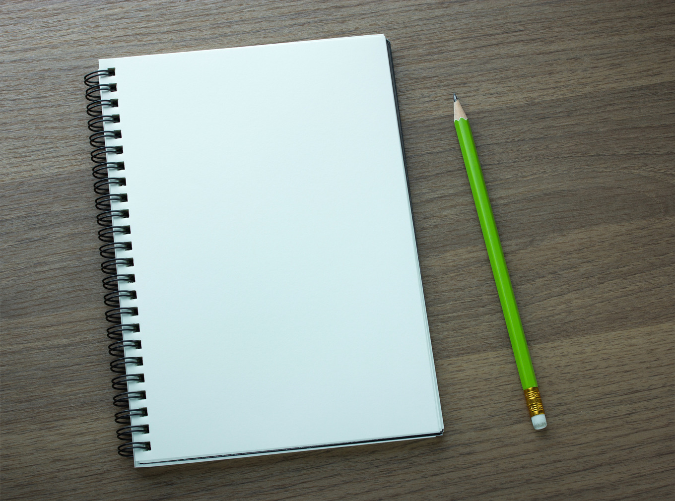 Blank spiral notebook and pencil containing notebook, paper, and ...