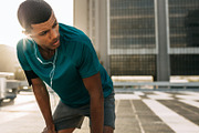 Taking a quick breath during his run | People Images ~ Creative Market