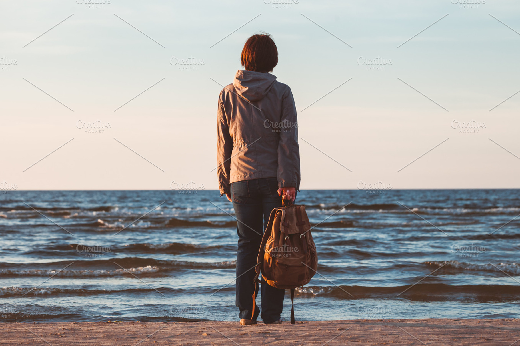 Woman looking to sea, a Person Photo by chamillewhite | Creative Market