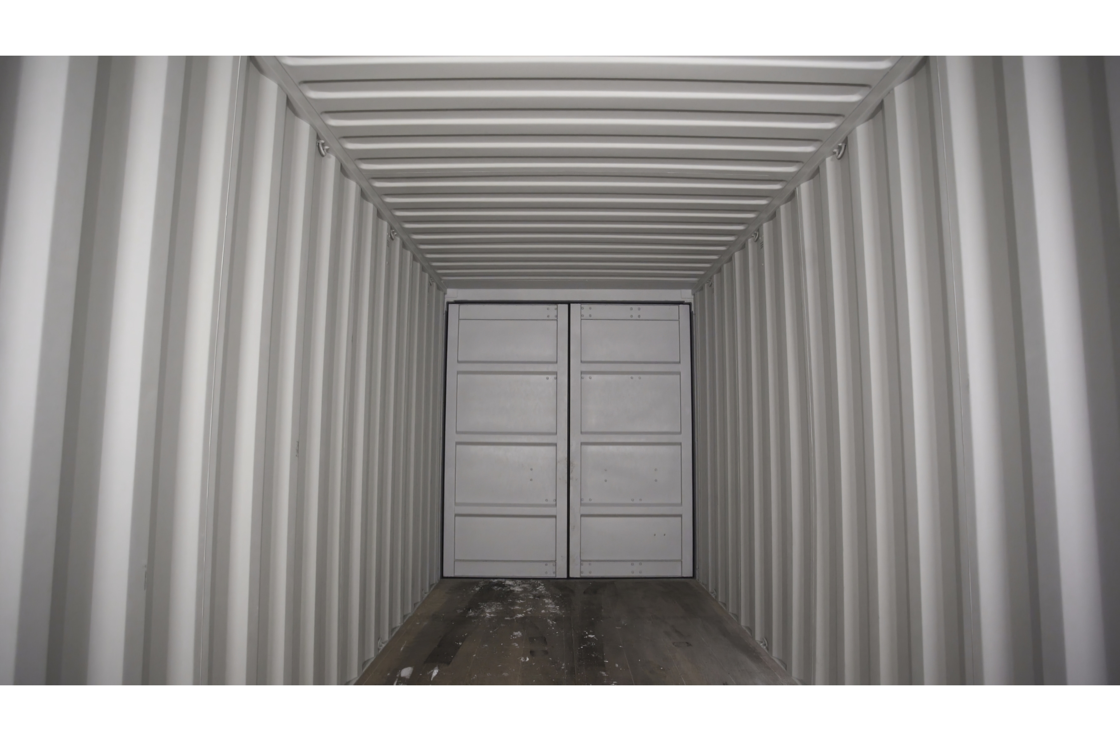 Inside large shipping container, a Background Graphic by Media Whale Stock