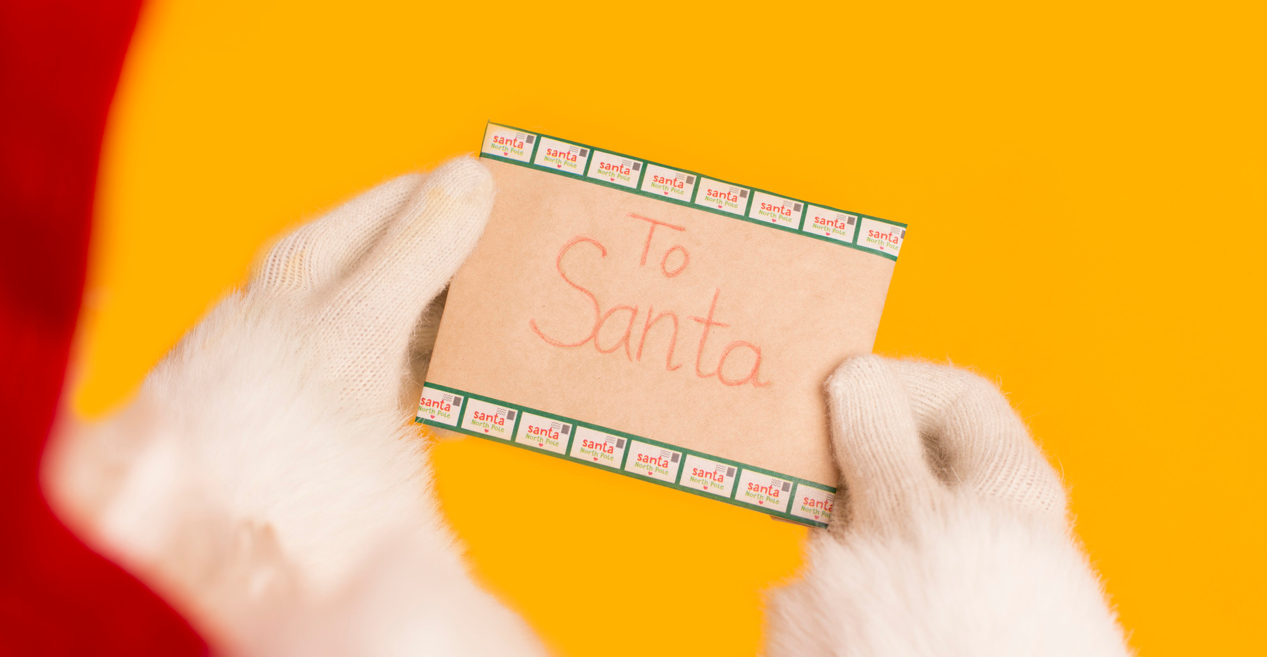 Santa Claus holding letter from chil, a Photo by Prostock-Studio ...