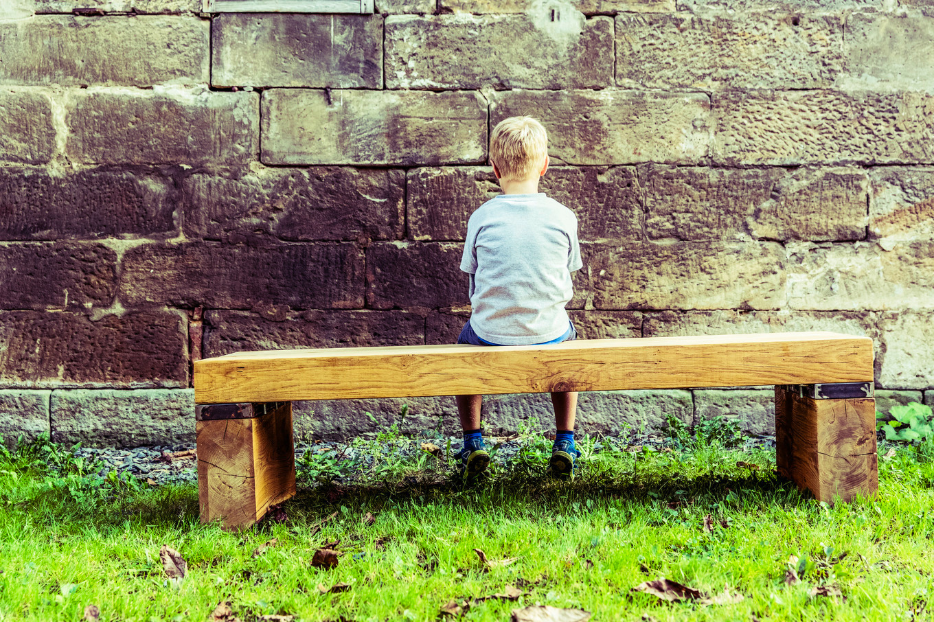 boy on a solid wood bench, an Industrial Photo by Markus Spiske | Images