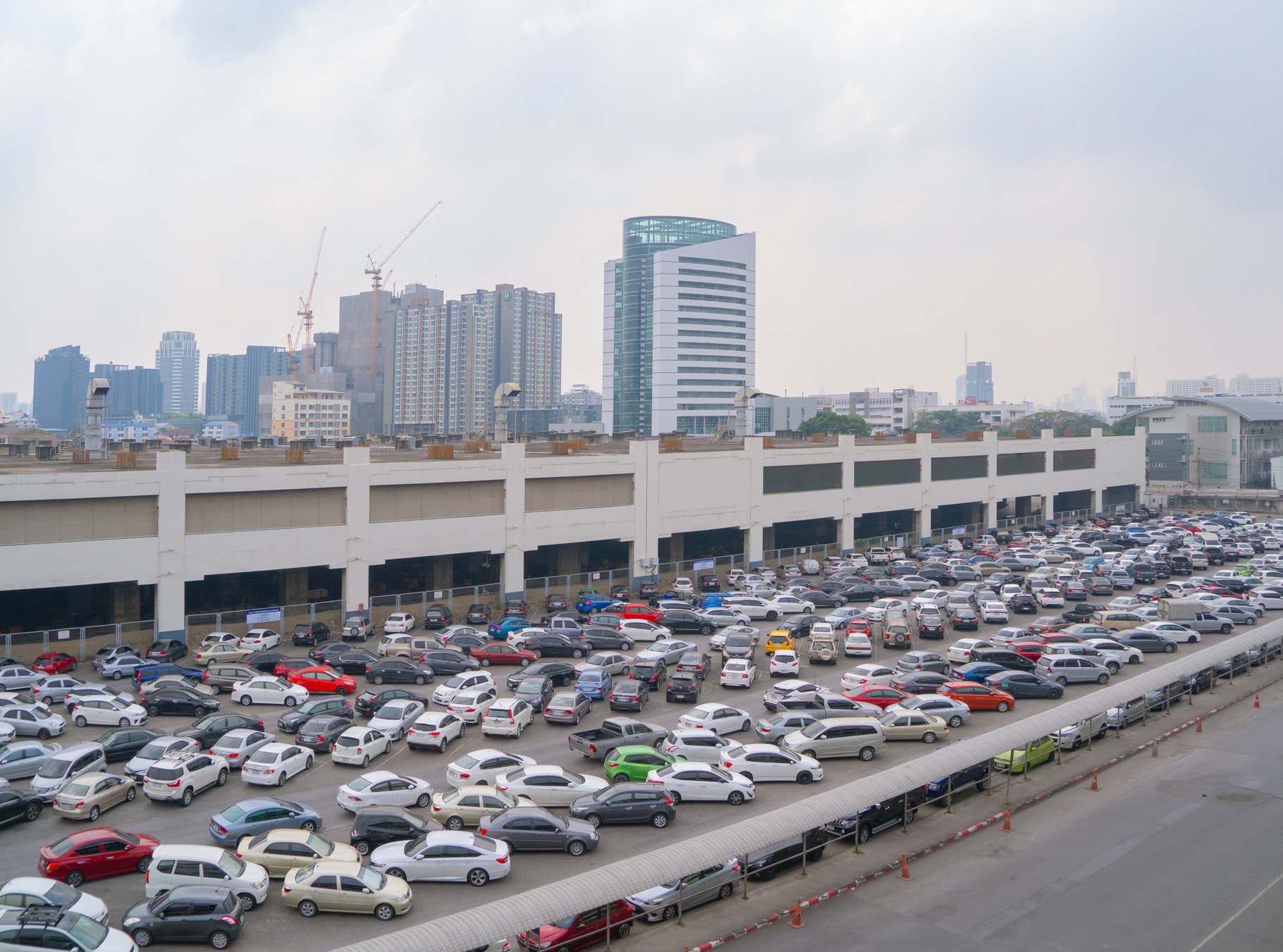 Rows of busy cars corporate parking lots in shopping malls in ur, a ...